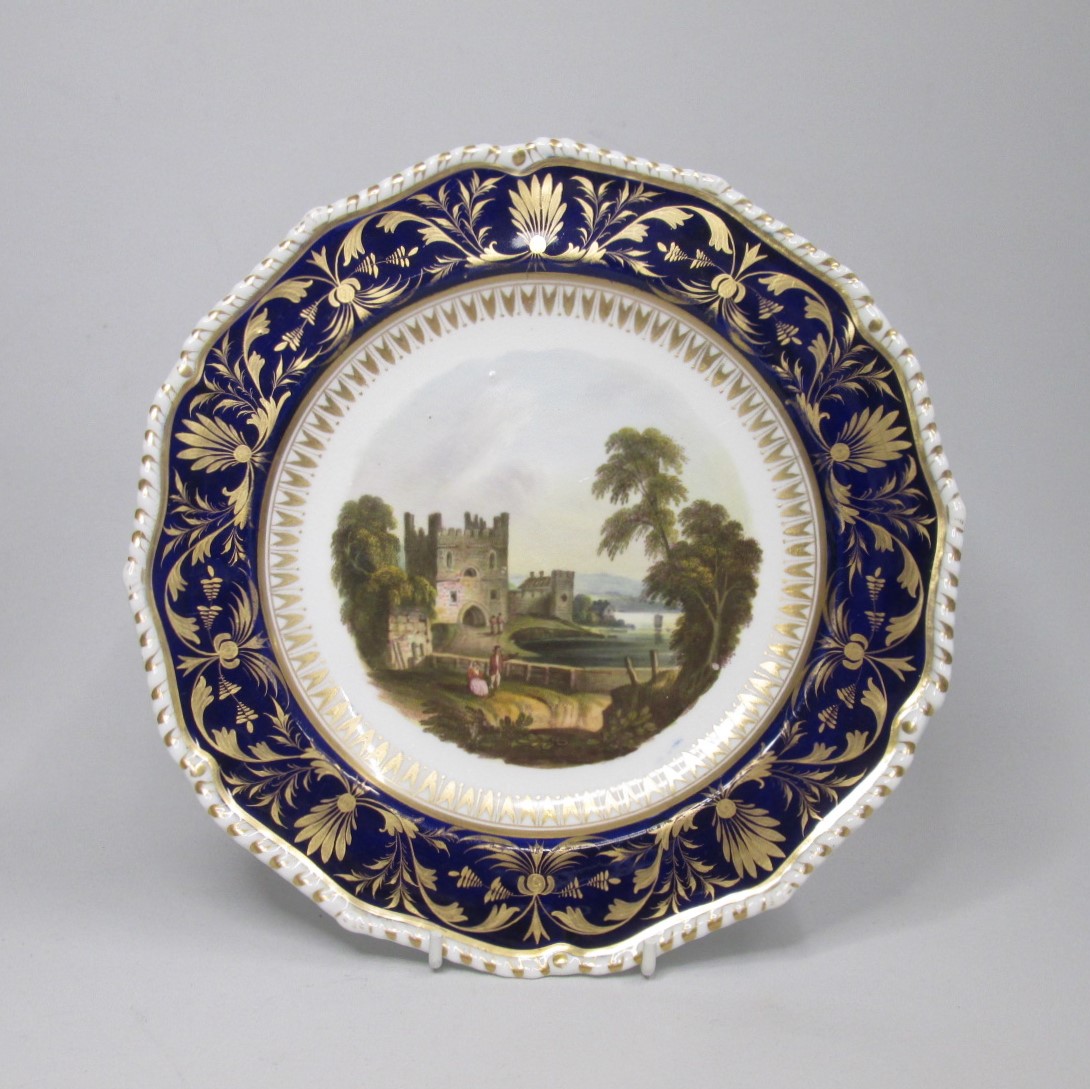 Bloor Derby Porcelain plate decorated with a blue and gilt border with ...