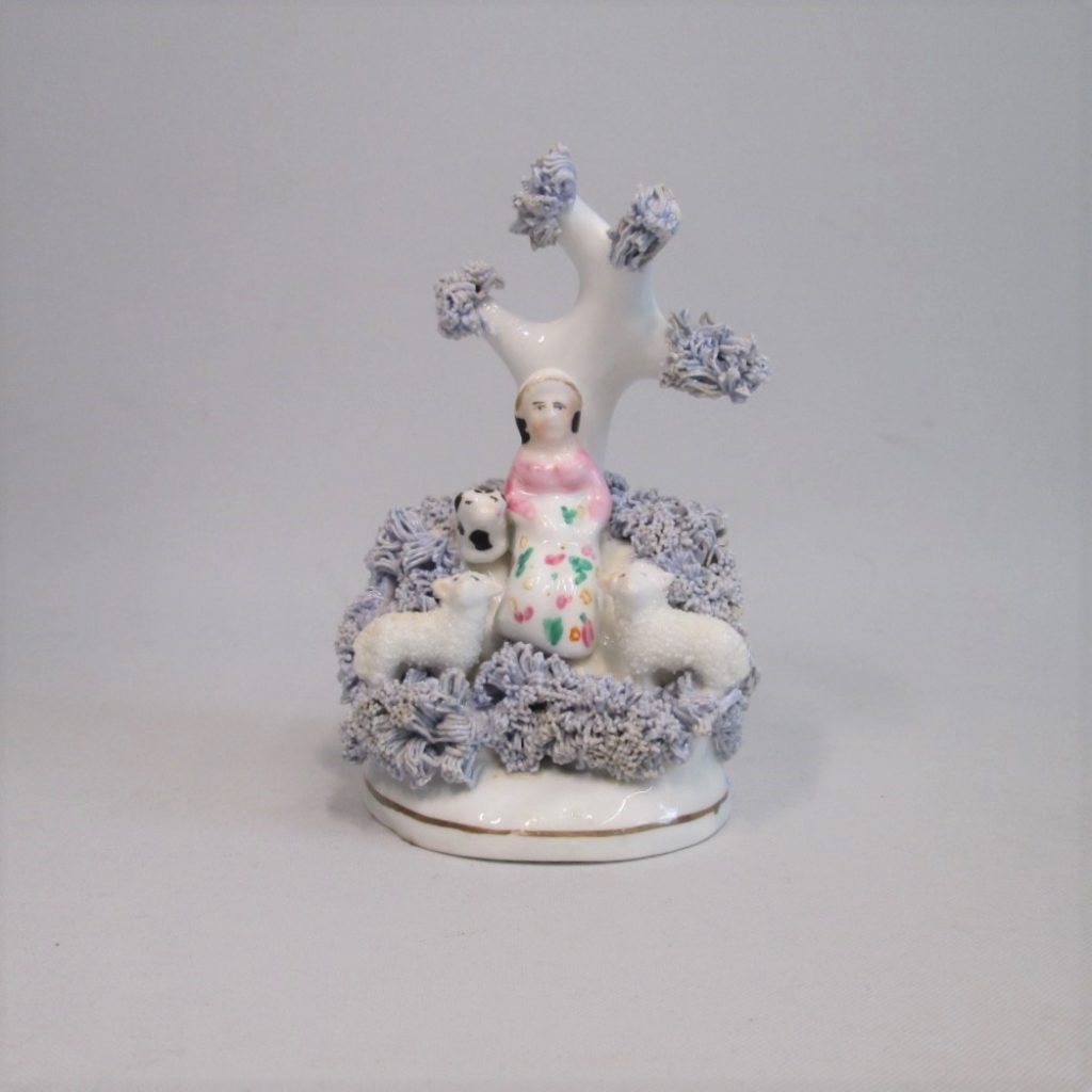 A small pair of Dudson figures modelled as seated Shepherd and ...