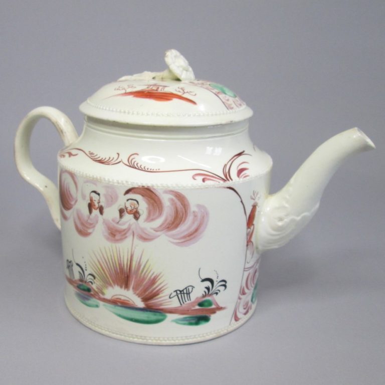 A rare Staffordshire William Greatbatch creamware teapot decorated with ...