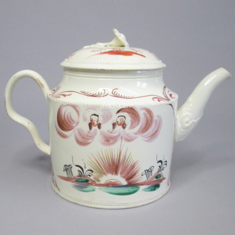 A rare Staffordshire William Greatbatch creamware teapot decorated with ...