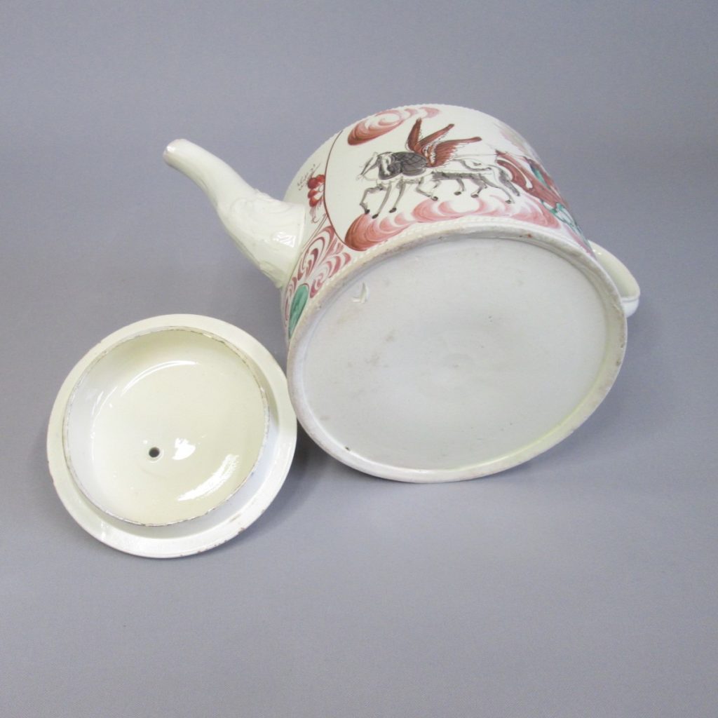 A rare Staffordshire William Greatbatch creamware teapot decorated with ...